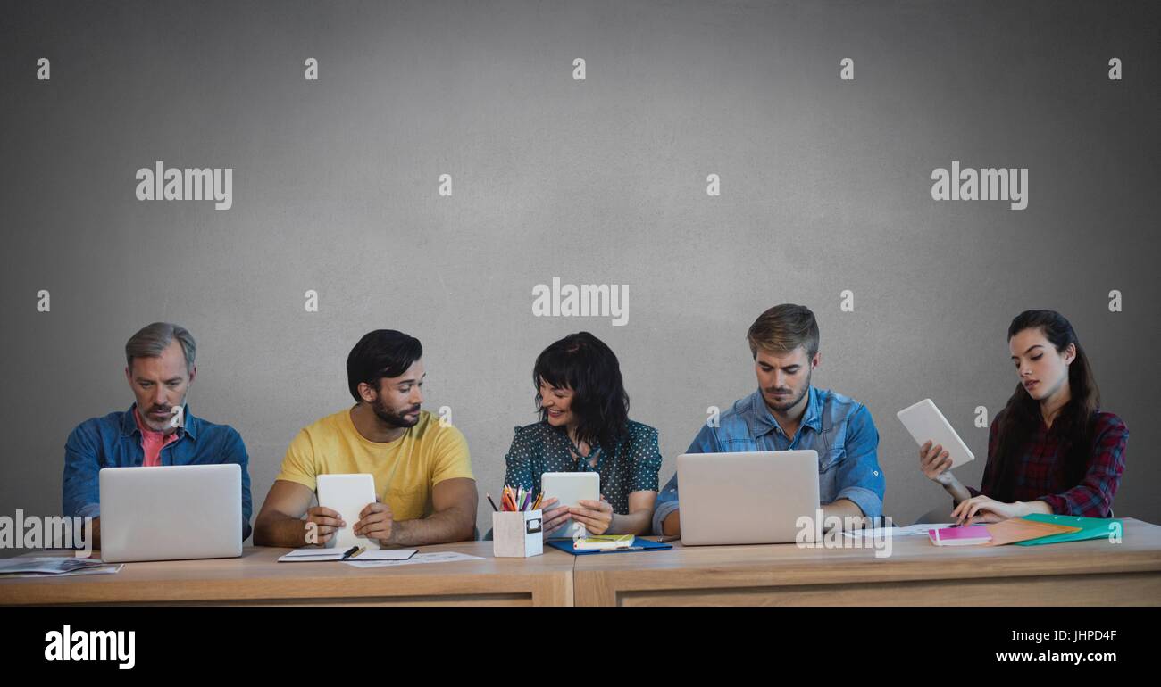 Digital composite of Group of people on devices in front of grey ...