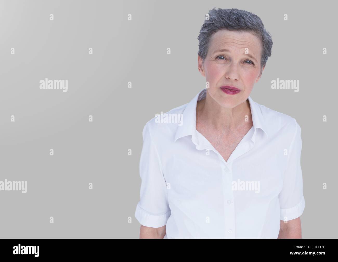 Digital composite of Portrait of woman with grey background Stock Photo ...