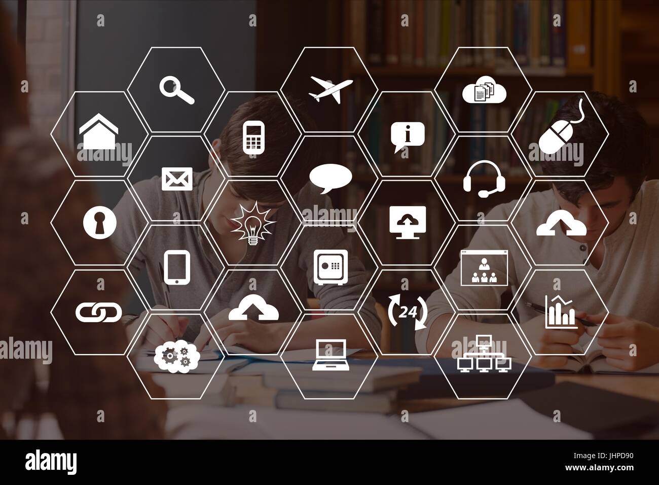 Digital composite of Icons against library background Stock Photo - Alamy