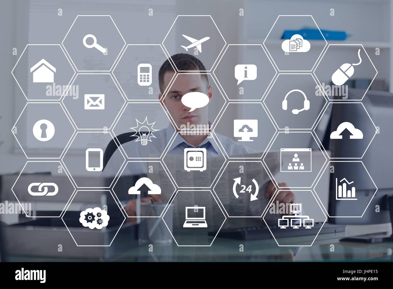 Digital composite of Icons against office background Stock Photo - Alamy