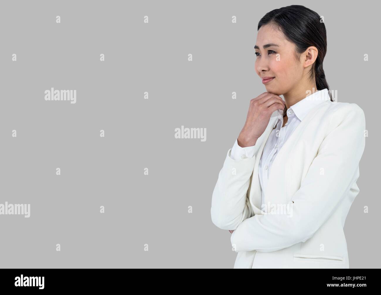 Digital composite of Portrait of woman with grey background Stock Photo ...