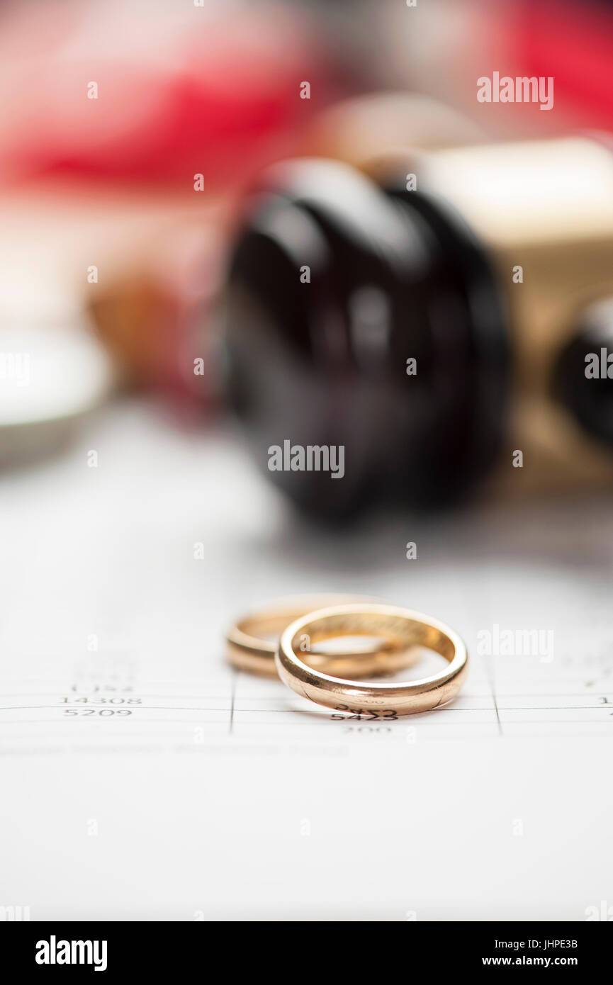 wedding rings and gavel Stock Photo - Alamy
