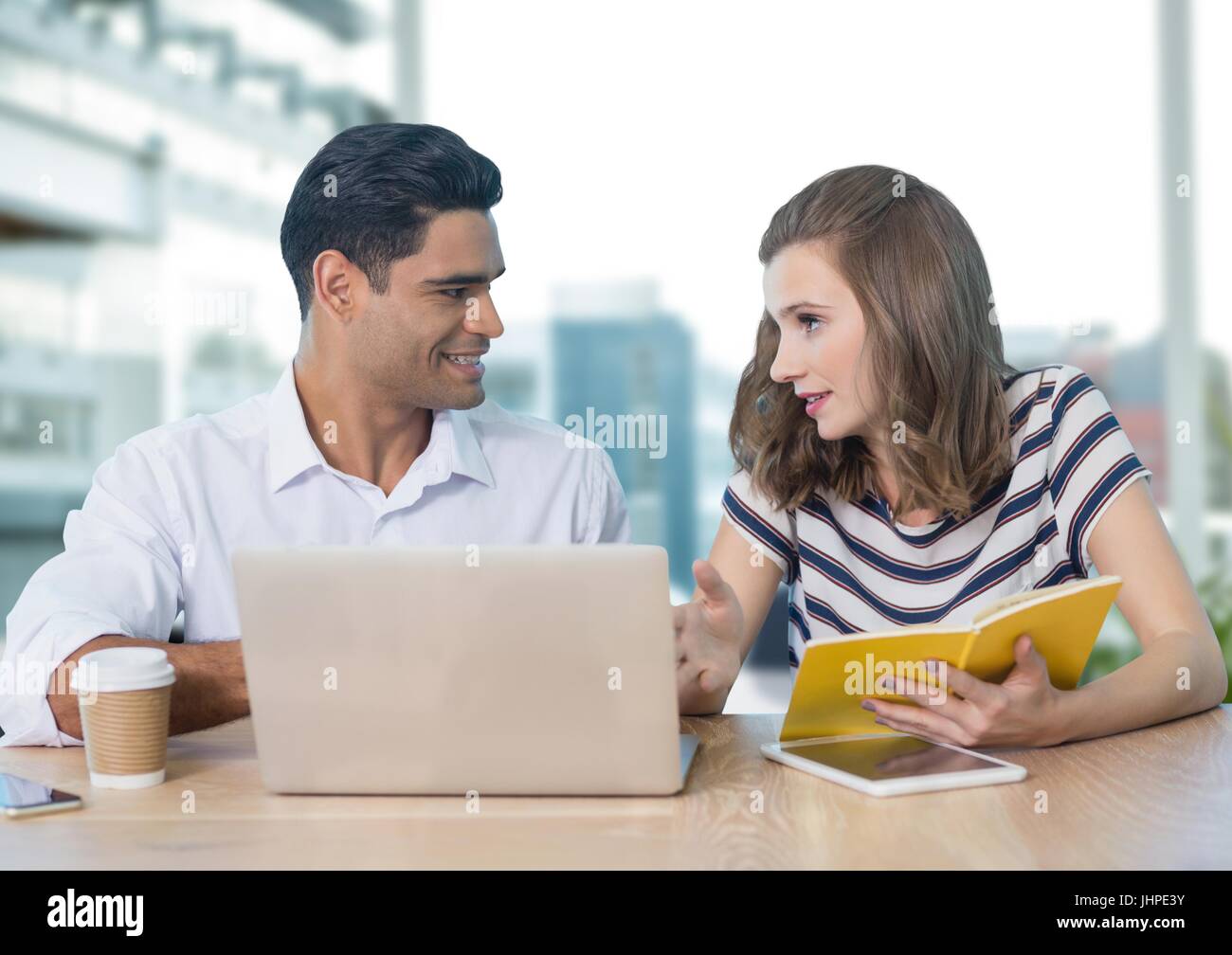 Digital composite of Business people at a desk using a computer Stock ...