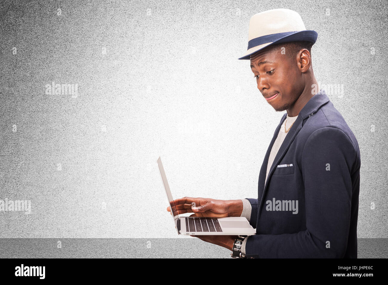 Happy smiling handsome business man with laptop computer Stock Photo ...