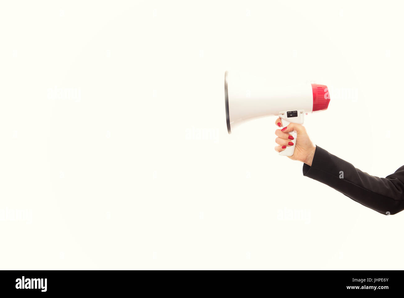 businessman's hand holding a megaphone isolated on white background ...