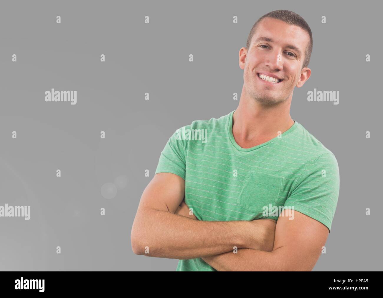Digital composite of Portrait of Man with arms folded with grey ...