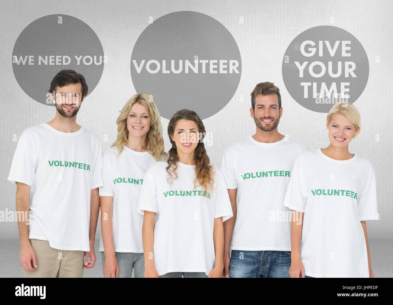 Digital composite of Group of volunteers standing in front of Volunteer ...