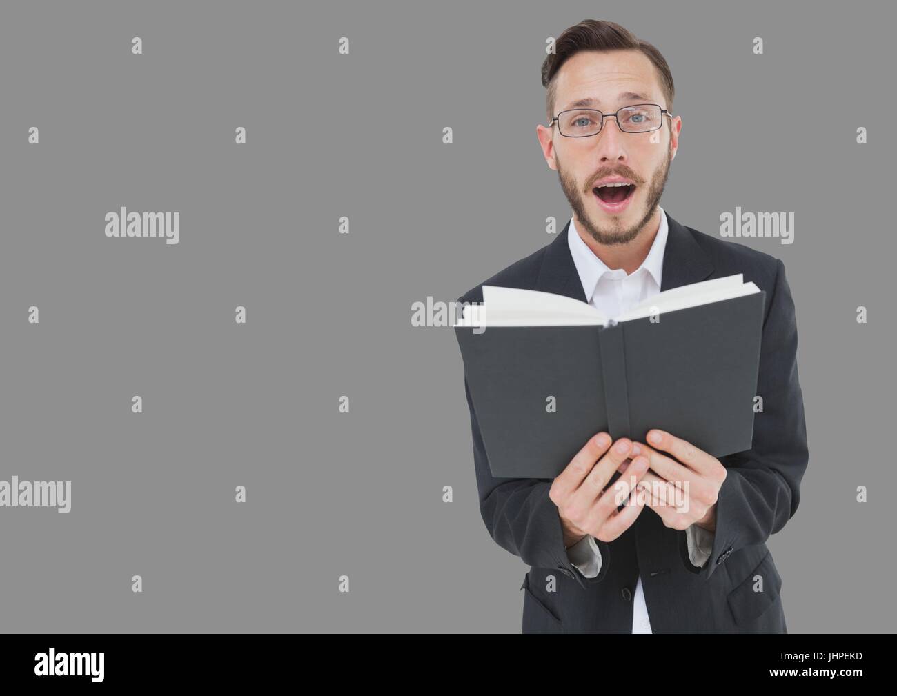 Digital composite of Portrait of Man reading book out loud with grey ...