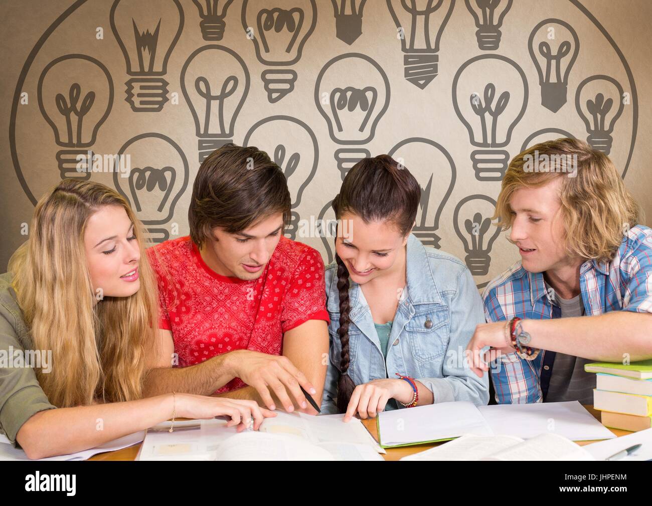 Digital composite of Group of students studying in front of light bulbs ...