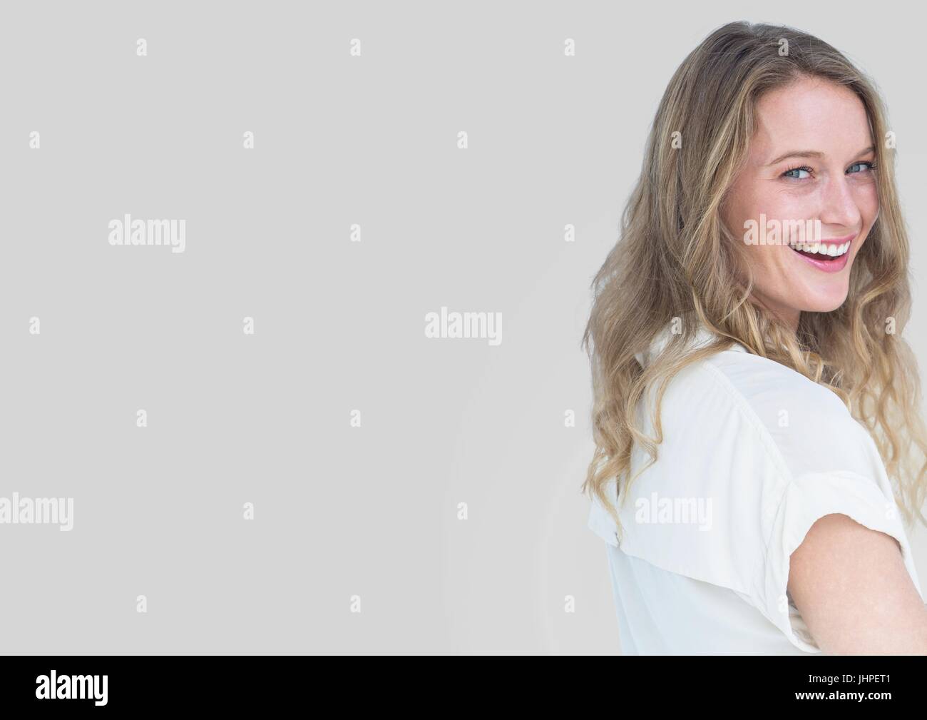 Digital composite of Portrait of woman with grey background Stock Photo ...