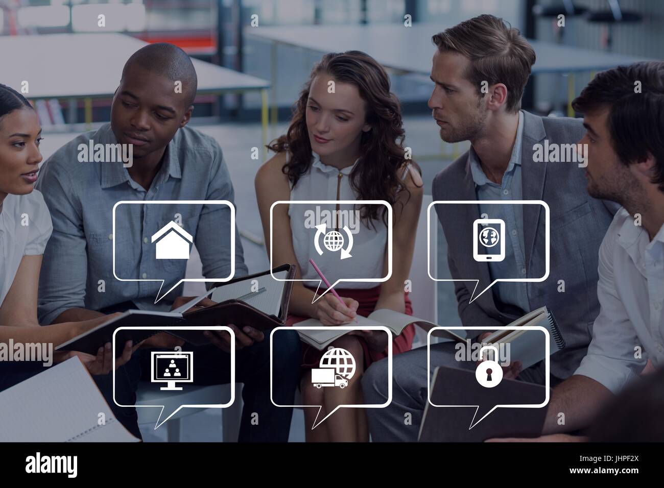 Digital composite of Icons against meeting background Stock Photo - Alamy