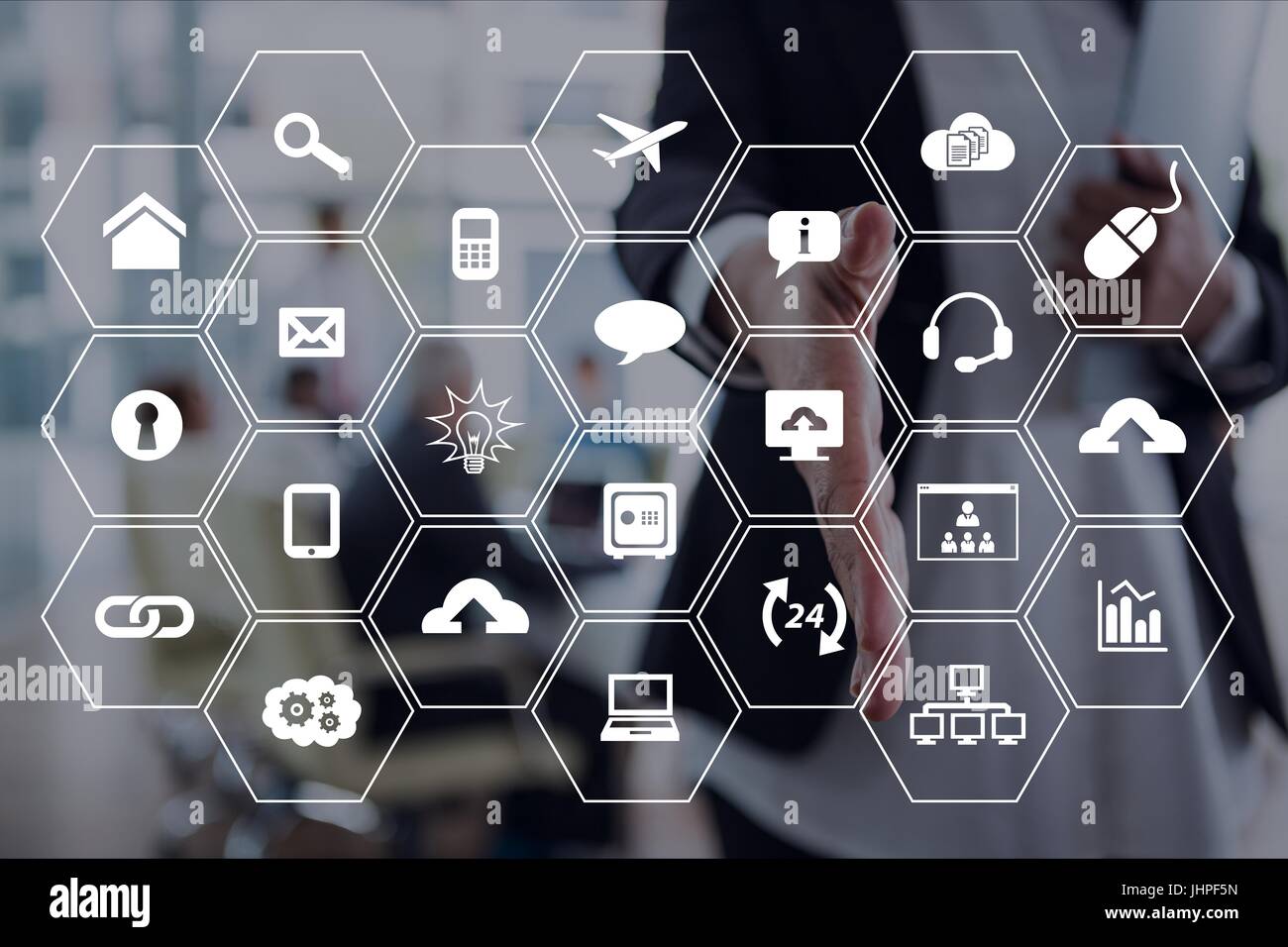 Digital composite of Icons against office background Stock Photo - Alamy