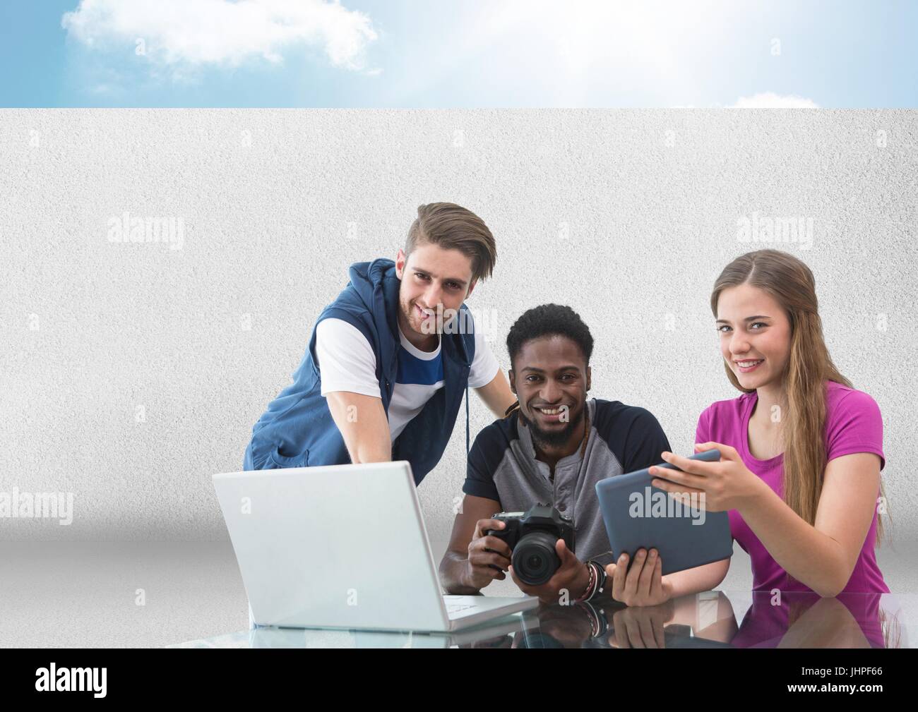 Digital composite of Group of people on laptop with camera in front of ...