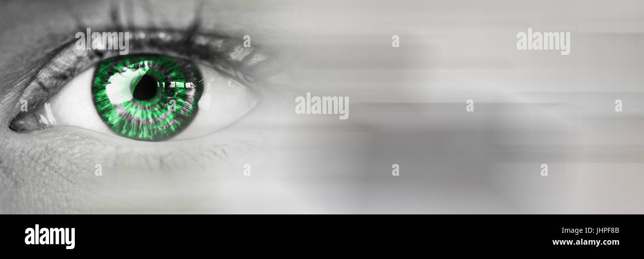 Digital composite of Close up of greyscale eye with green iris and ...