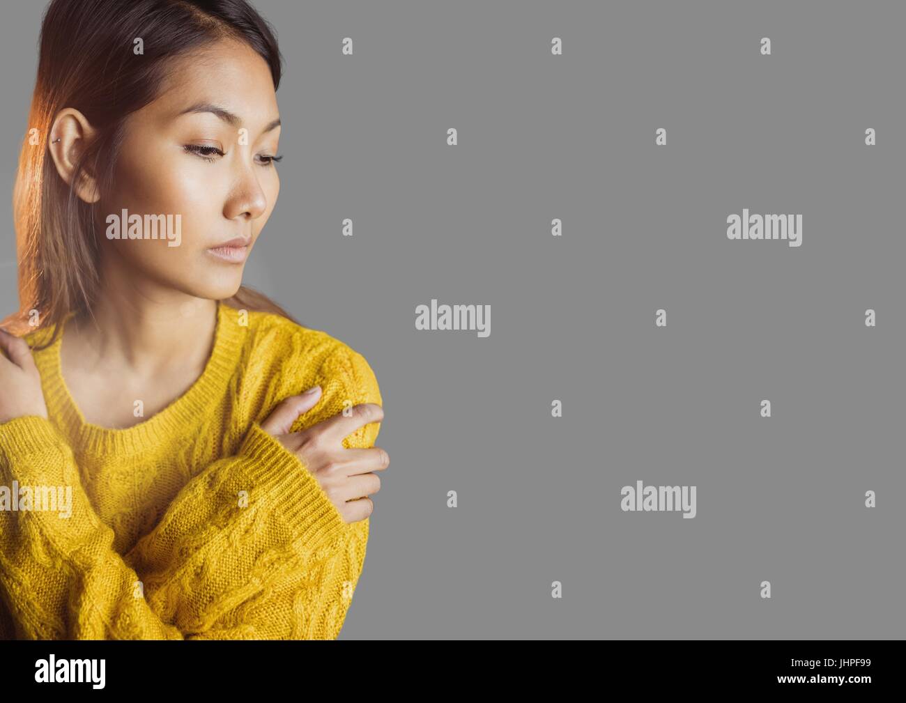 Digital composite of Portrait of woman with grey background Stock Photo ...