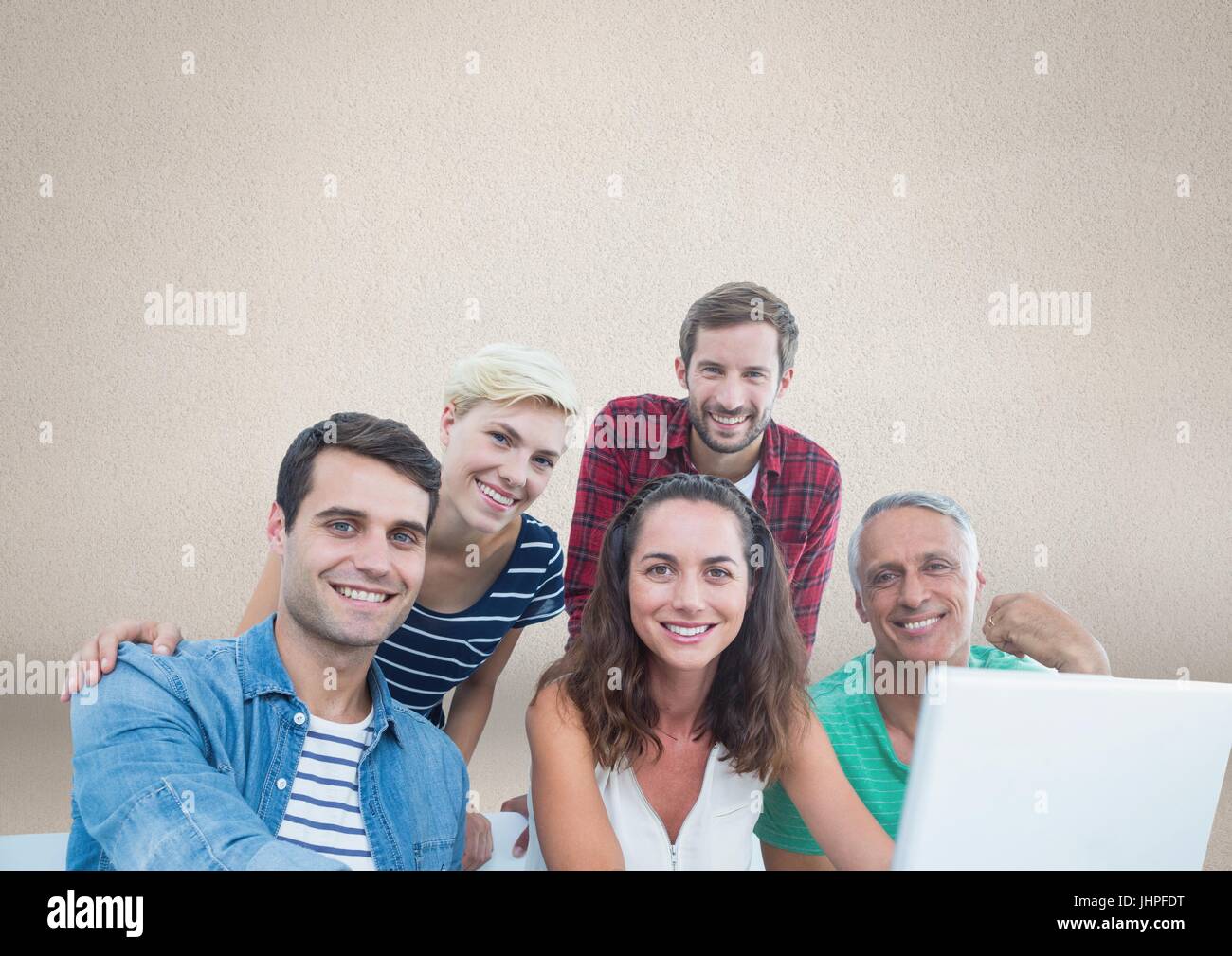 Digital composite of Group of people on laptop in front of brown ...