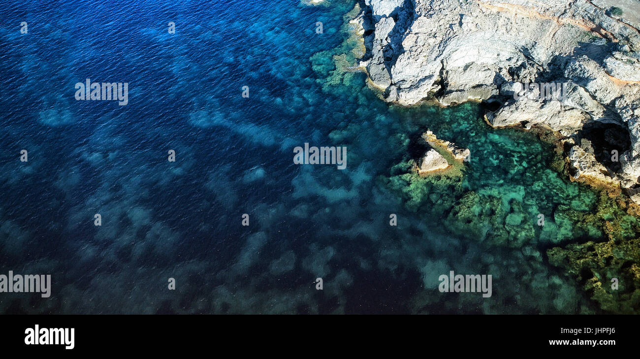 Aerial view of sea by cliff Stock Photo - Alamy