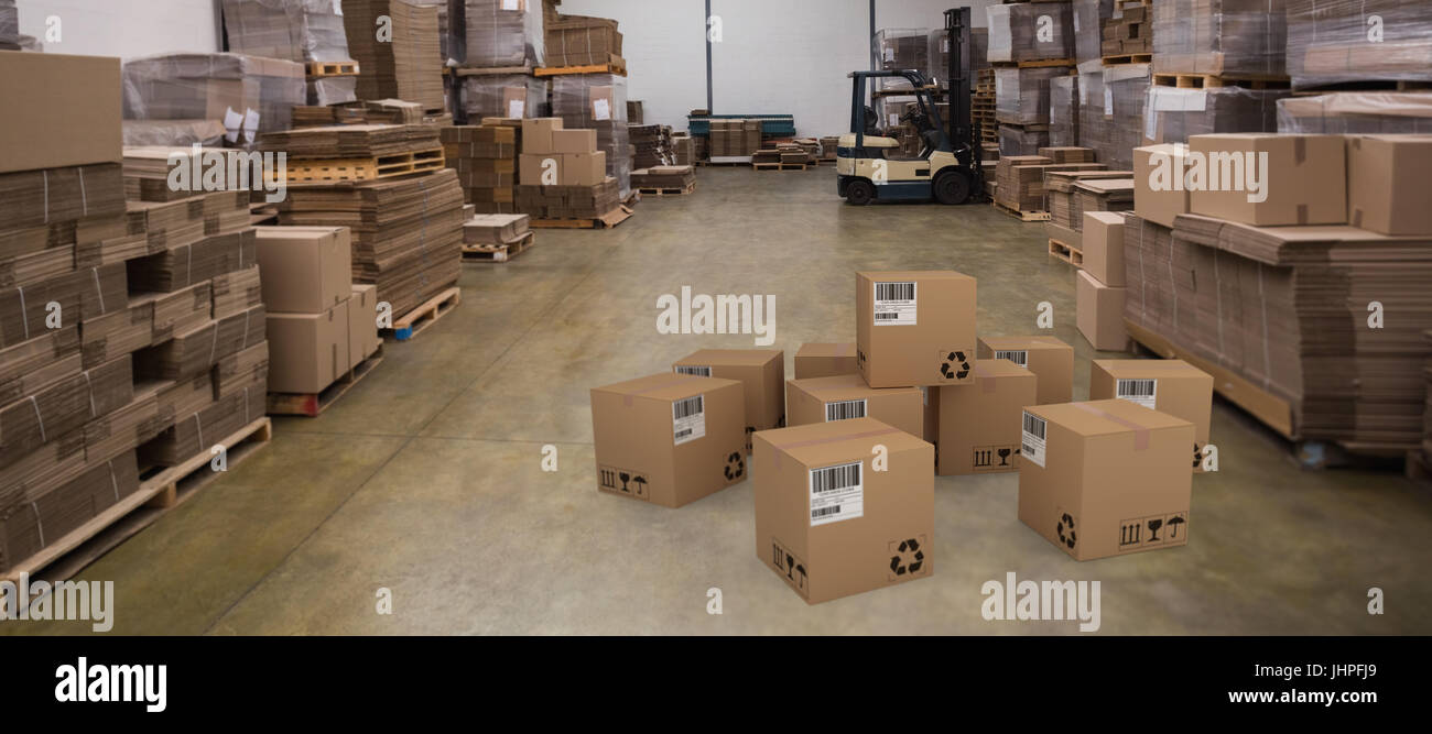 Group of composite cardboard boxes against forklift in a large ...