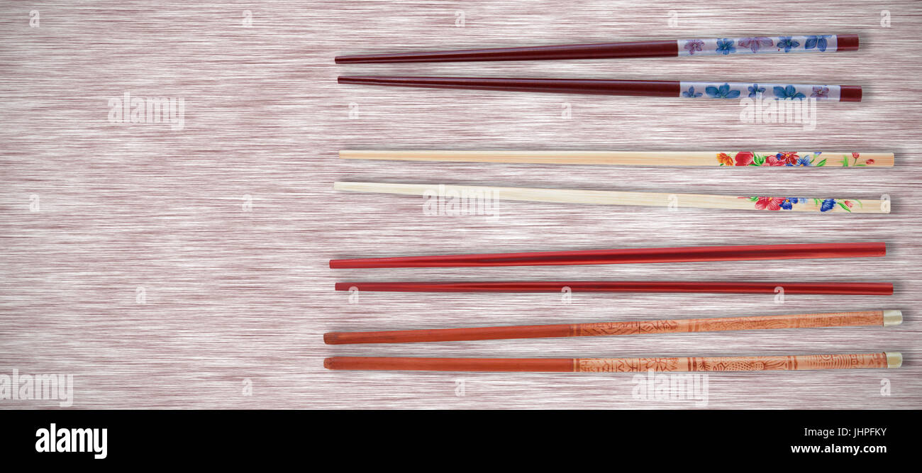Chopsticks on white background against grey texture background Stock ...