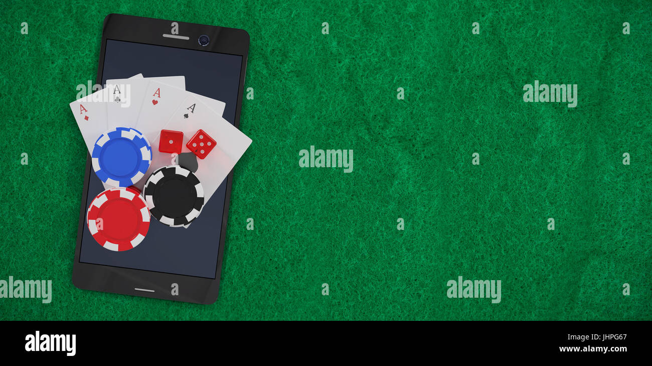 Overhead view of mobile phone with casino tokens and playing cards ...