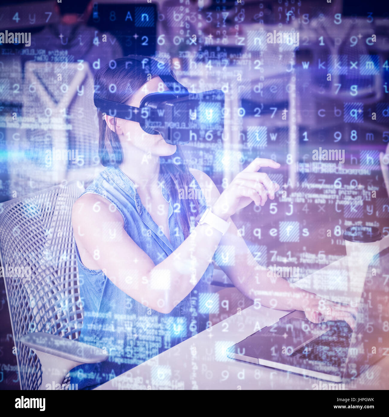 Businesswoman gesturing while wearing virtual reality simulator at ...