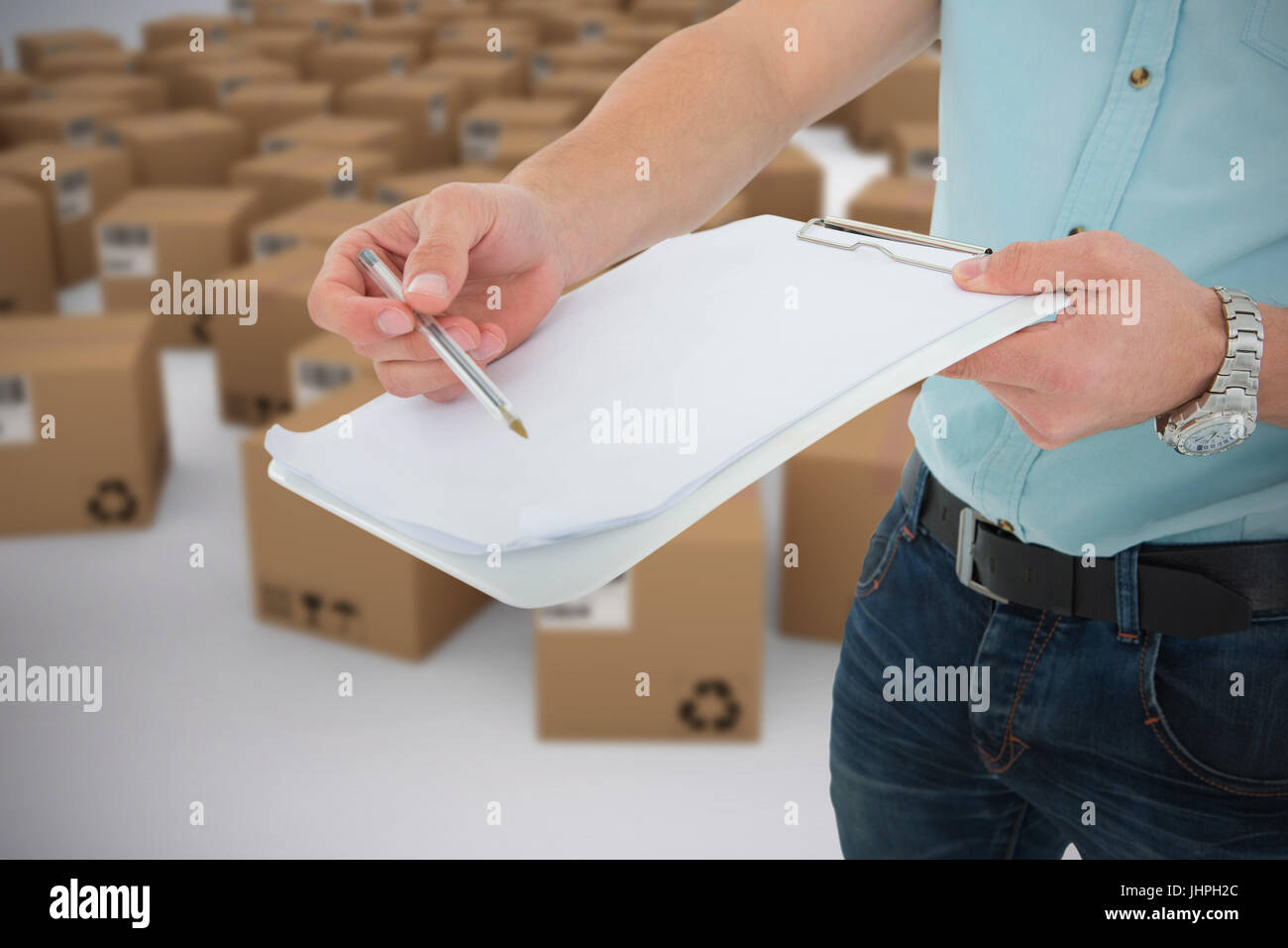 Delivery man with clipboard asking for signature against grey ...