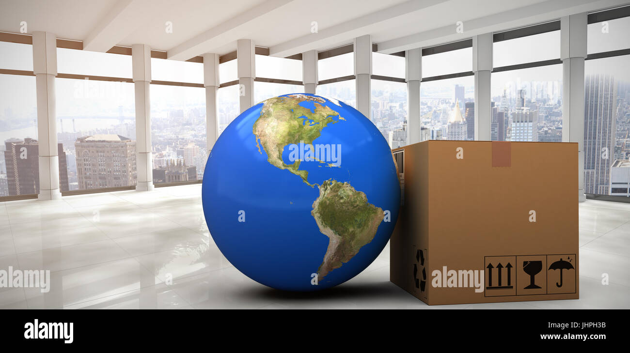 3D image of planet Earth by cardboard box against modern room ...