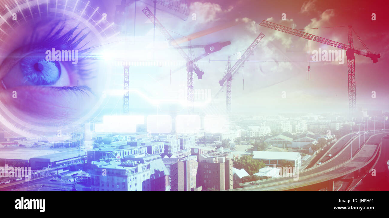 Blue eye looking up on female face against overhead view of architect ...