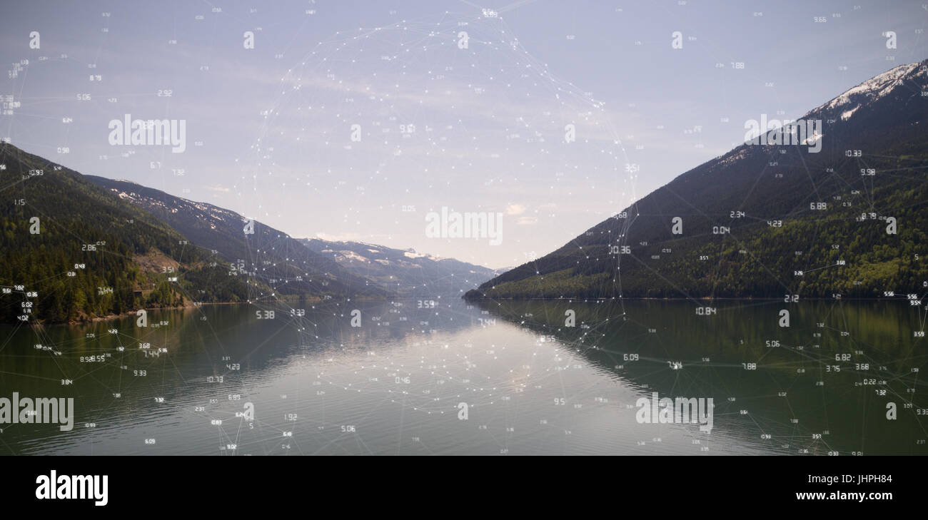 Constellation of stars against mountains reflecting on river against ...