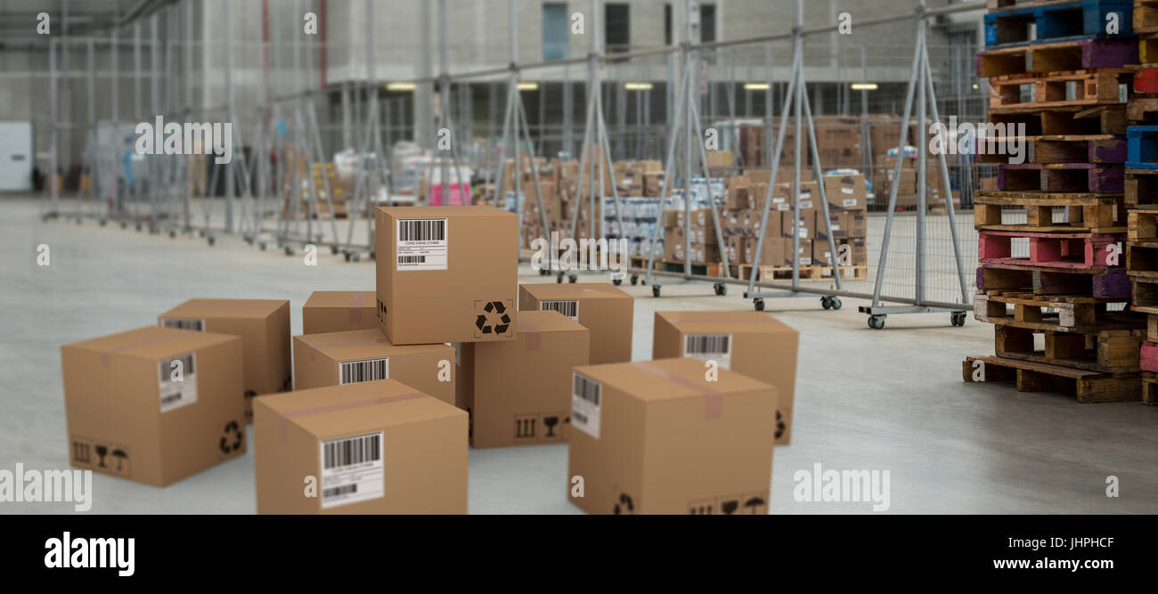 Group of composite cardboard boxes against image of a warehouse Stock ...