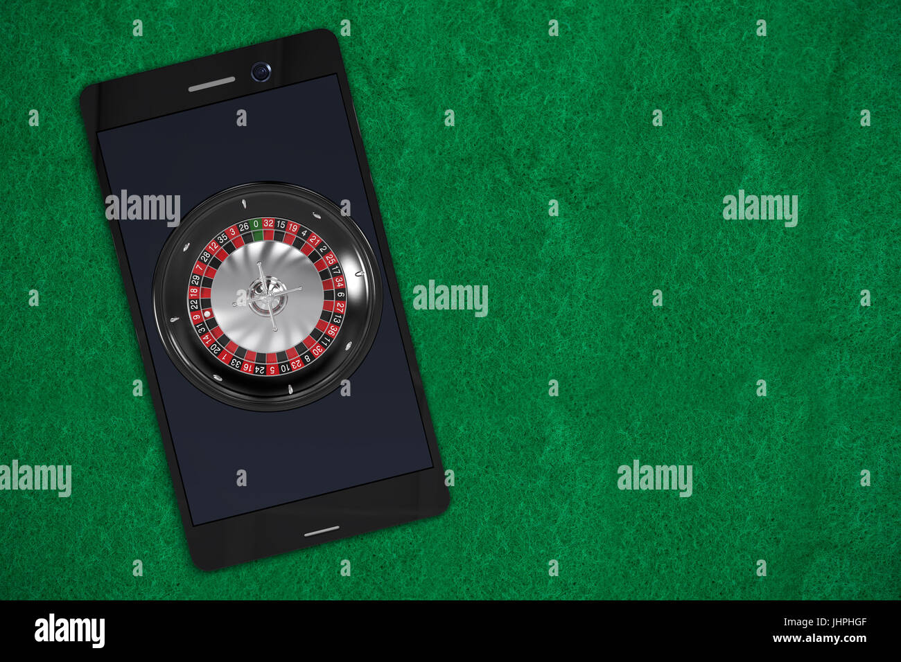 3D image of mobile phone with roulette against green painted paper ...
