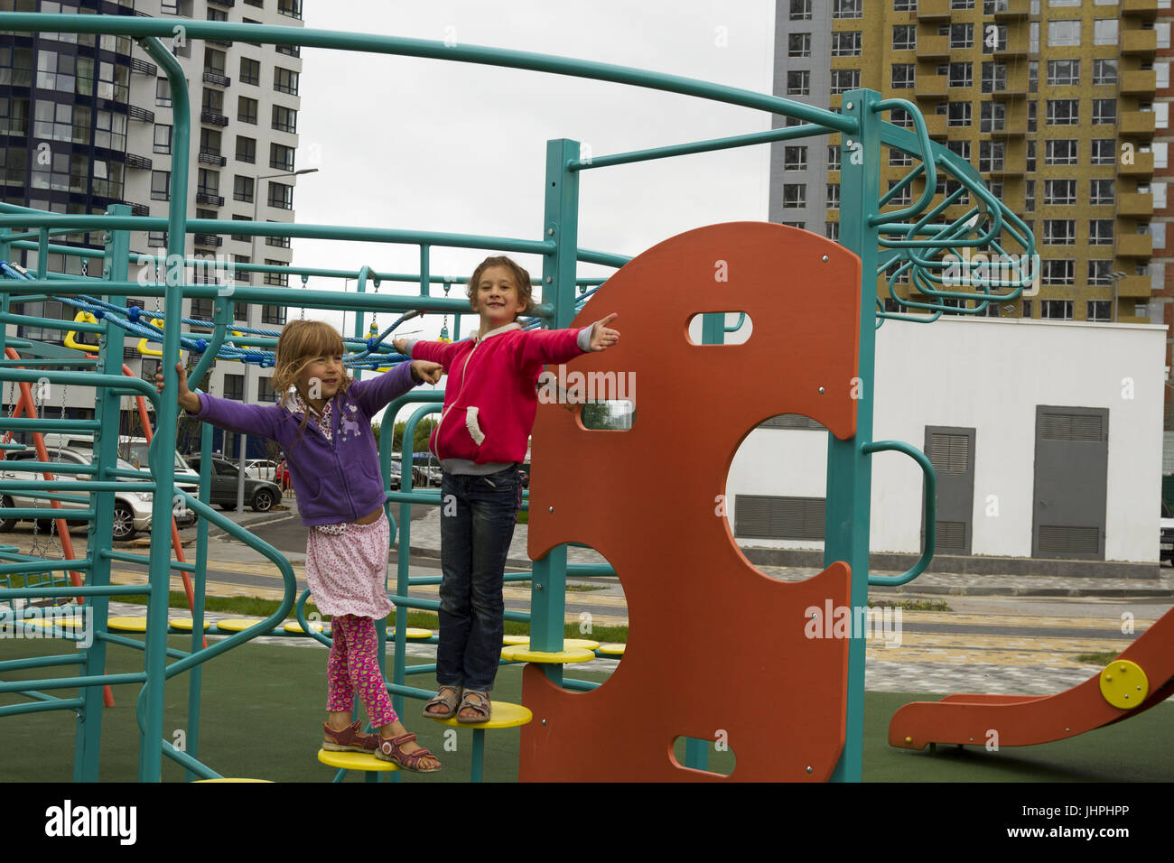 Happy children playing outdoors Stock Photo - Alamy