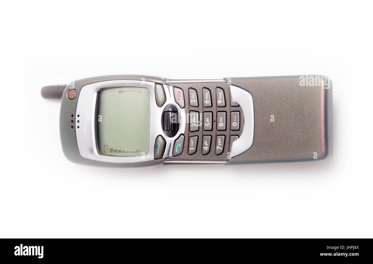 Old Mobile Phone. disposed obsolete phone on white background Stock ...