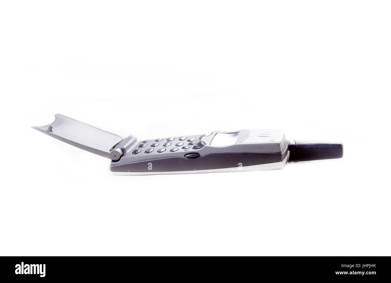 Old Mobile Phone. disposed obsolete phone on white background Stock ...