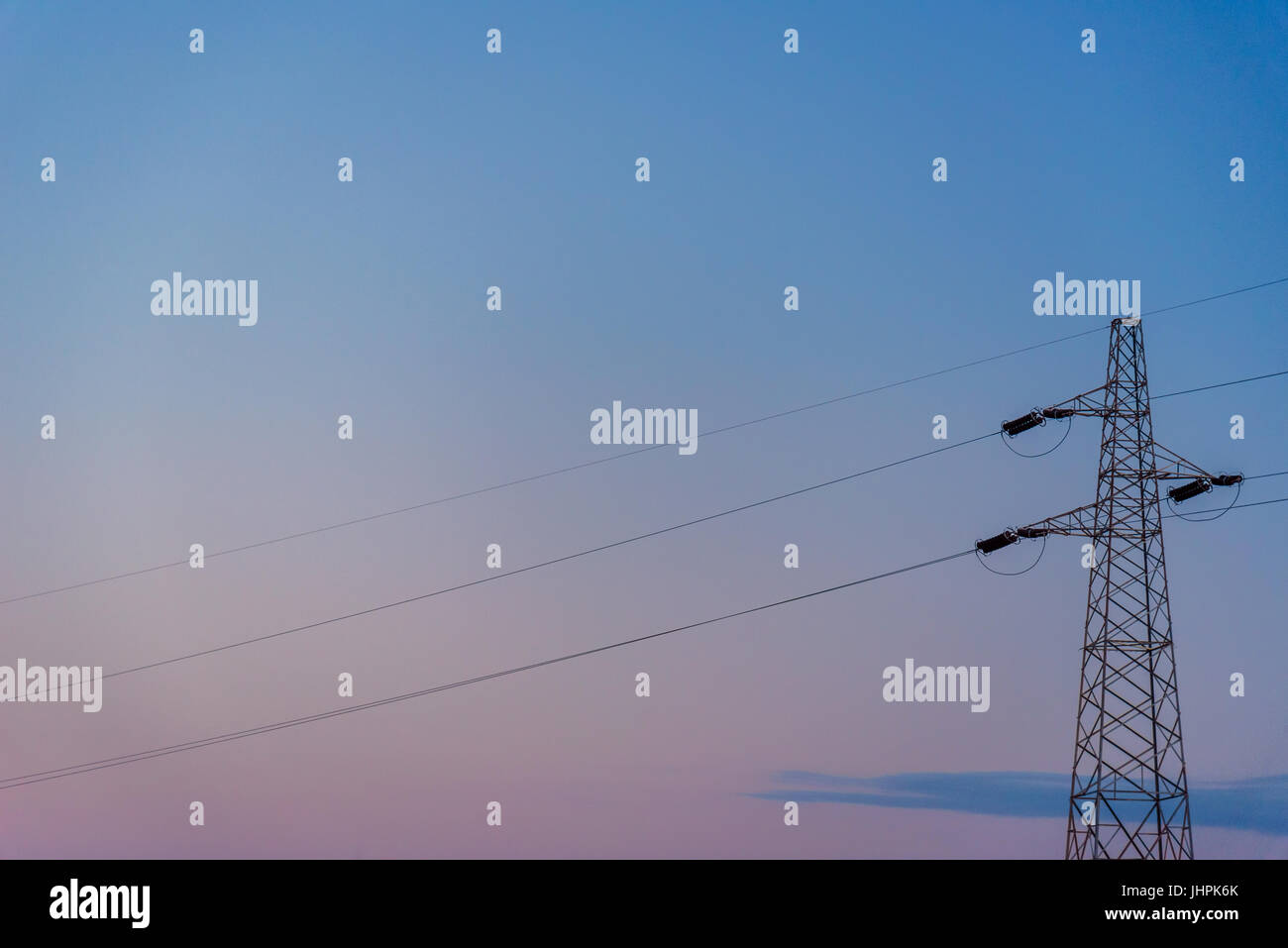 Silhouette of a powerline at sunset Stock Photo - Alamy