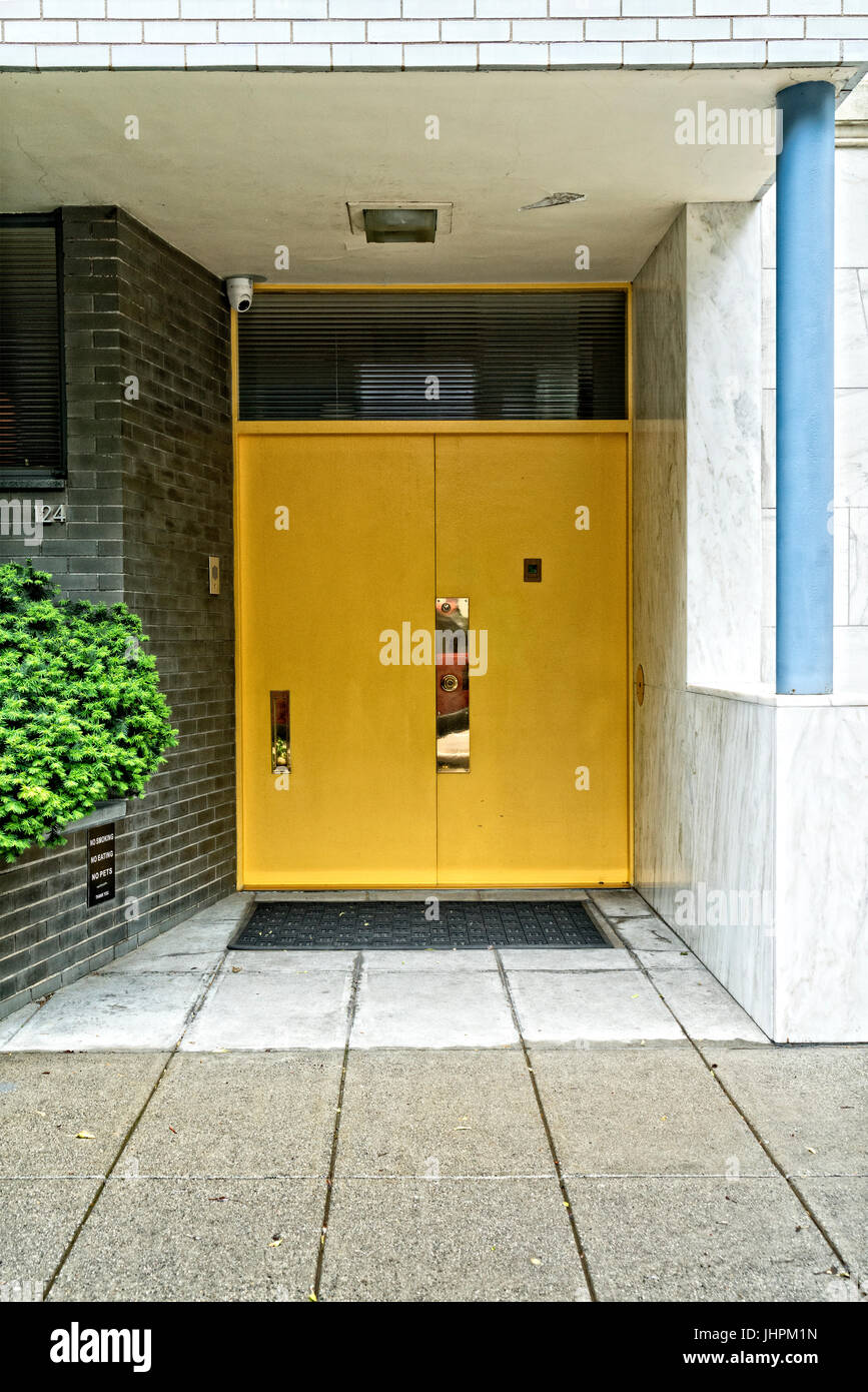 Yellow Front Entry Door on a Manhattan, NYC Town House Stock Photo - Alamy