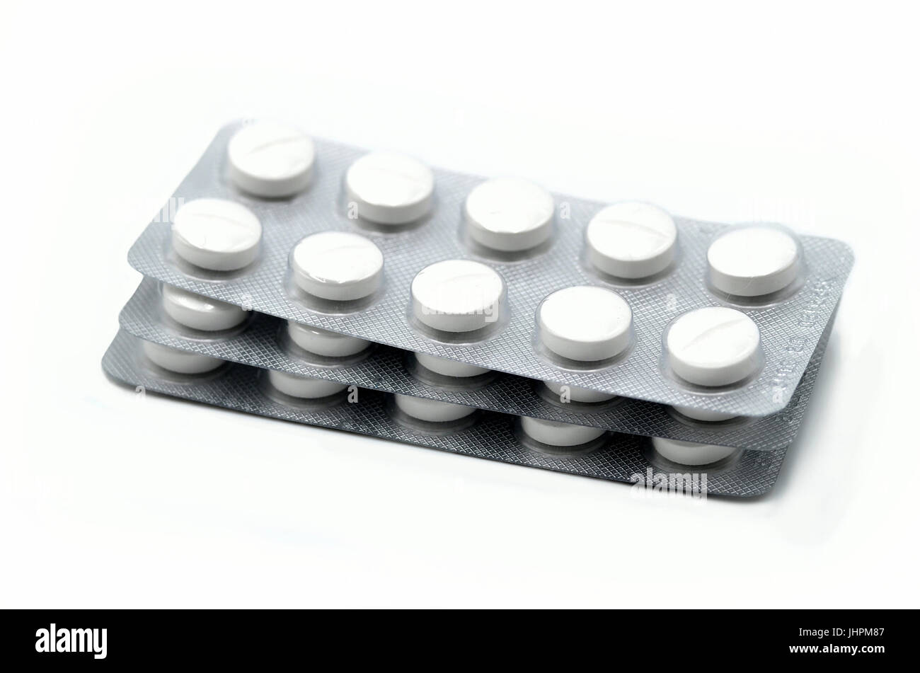 Medicine tablets on white background Stock Photo - Alamy
