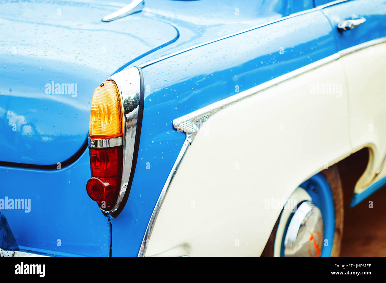 Retro car rear lantern on city street Stock Photo - Alamy
