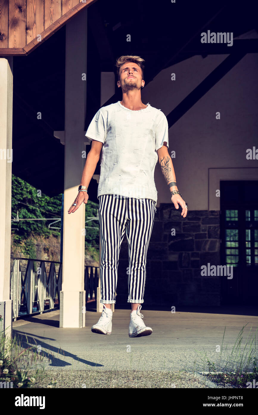 Man levitating hi-res stock photography and images - Alamy