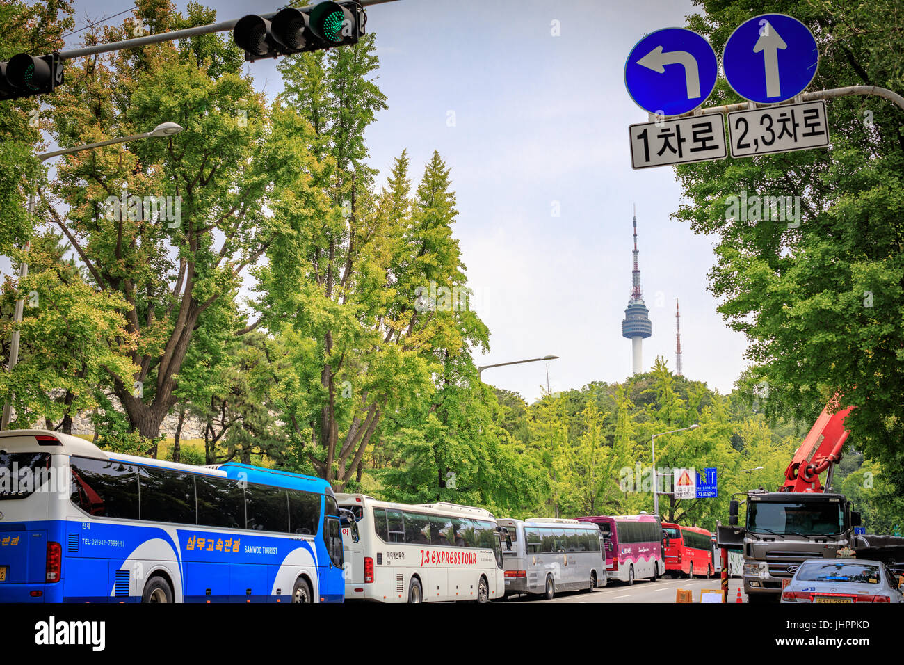 Tourist buses at Namsan Baekbeom Plaza behind N seoul tower on Jun 20 ...