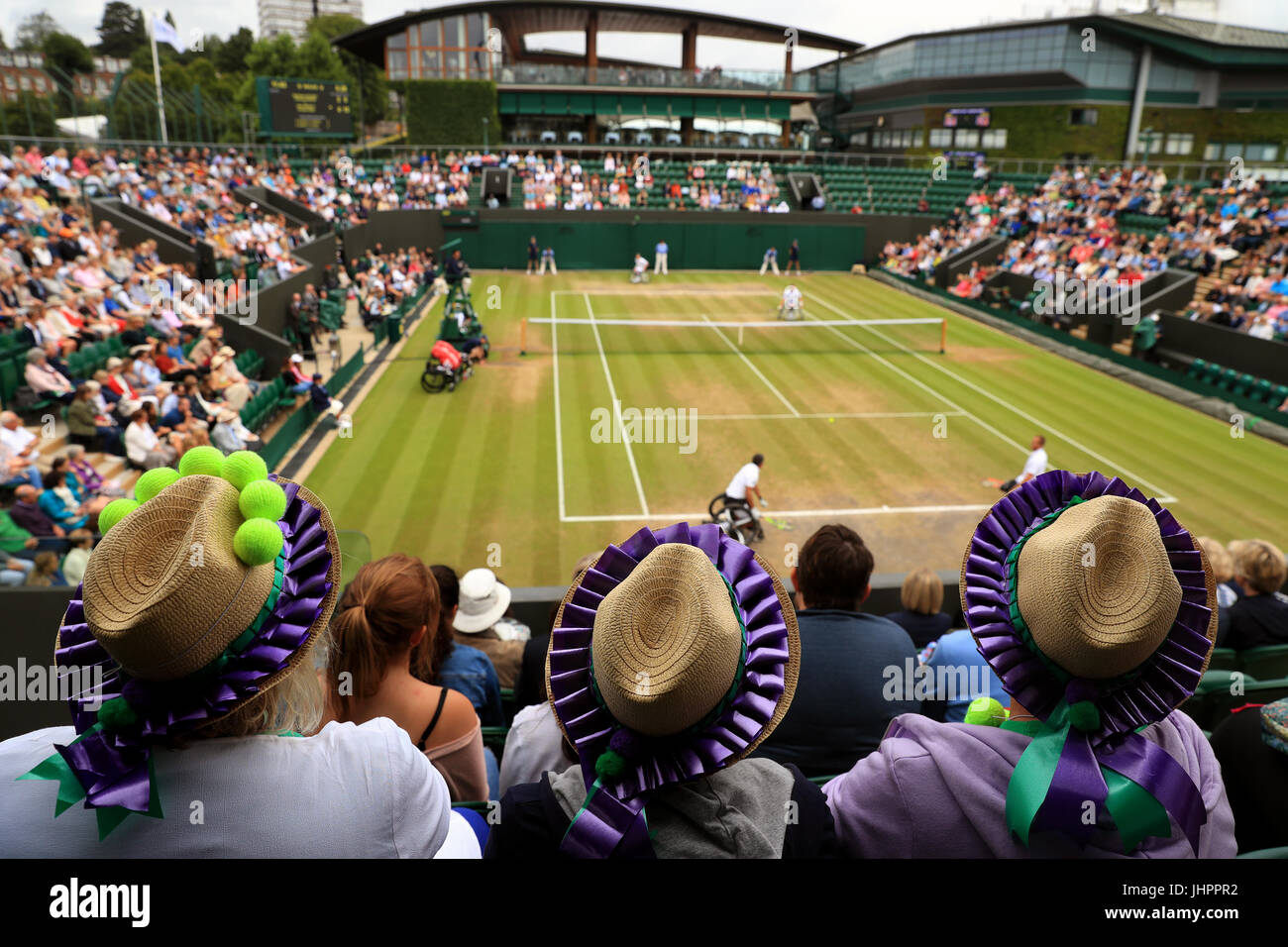 Spectators Watching A Tennis Volley