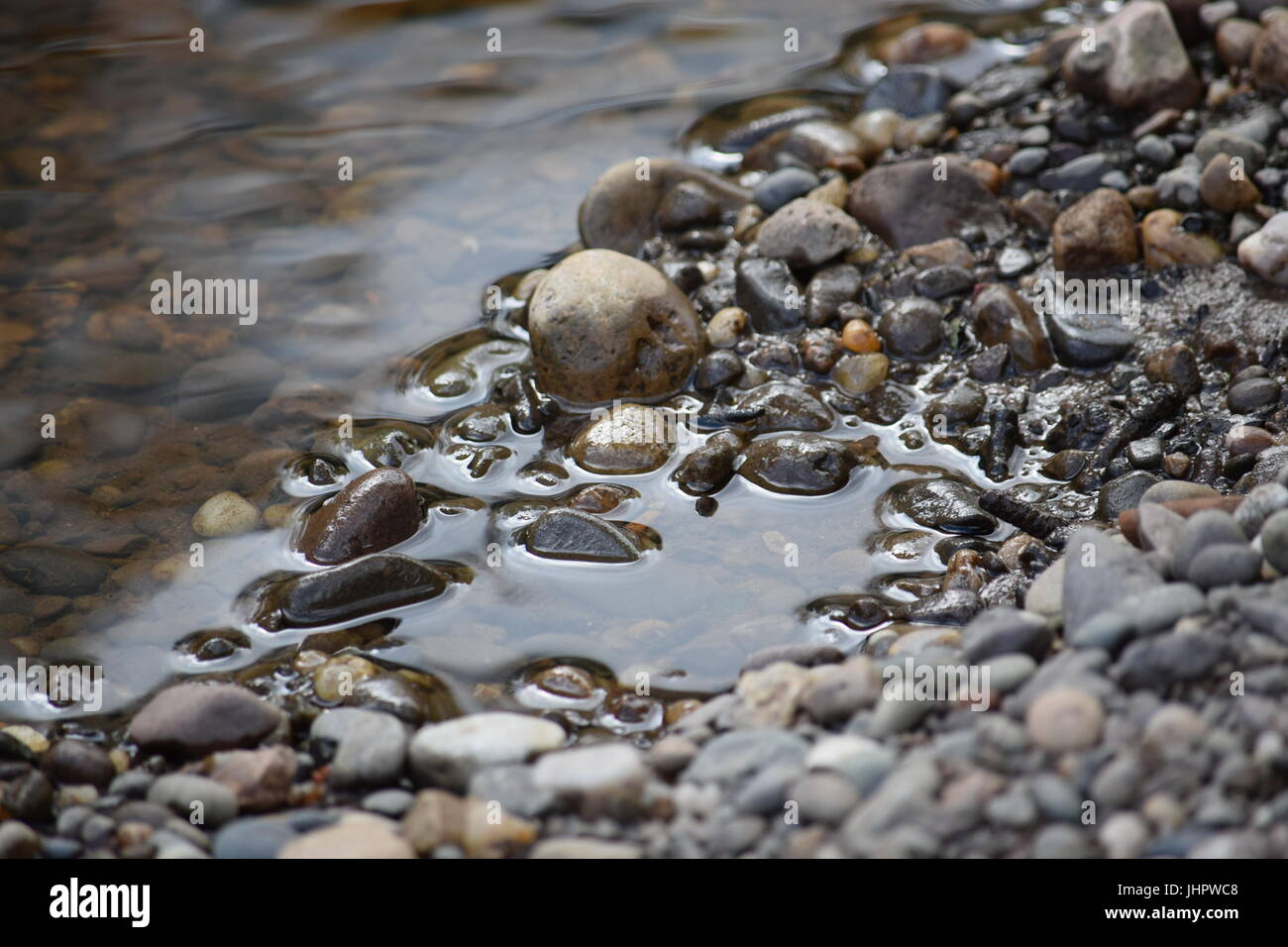 Rocks and water Stock Photo - Alamy