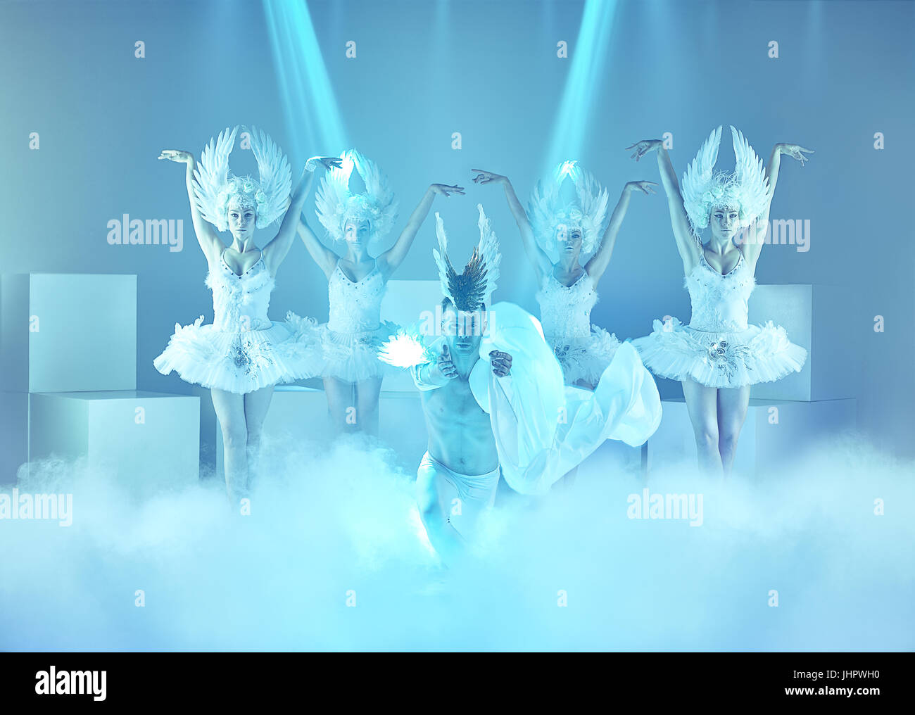 The studio shot of group of modern dancers on blue background Stock ...