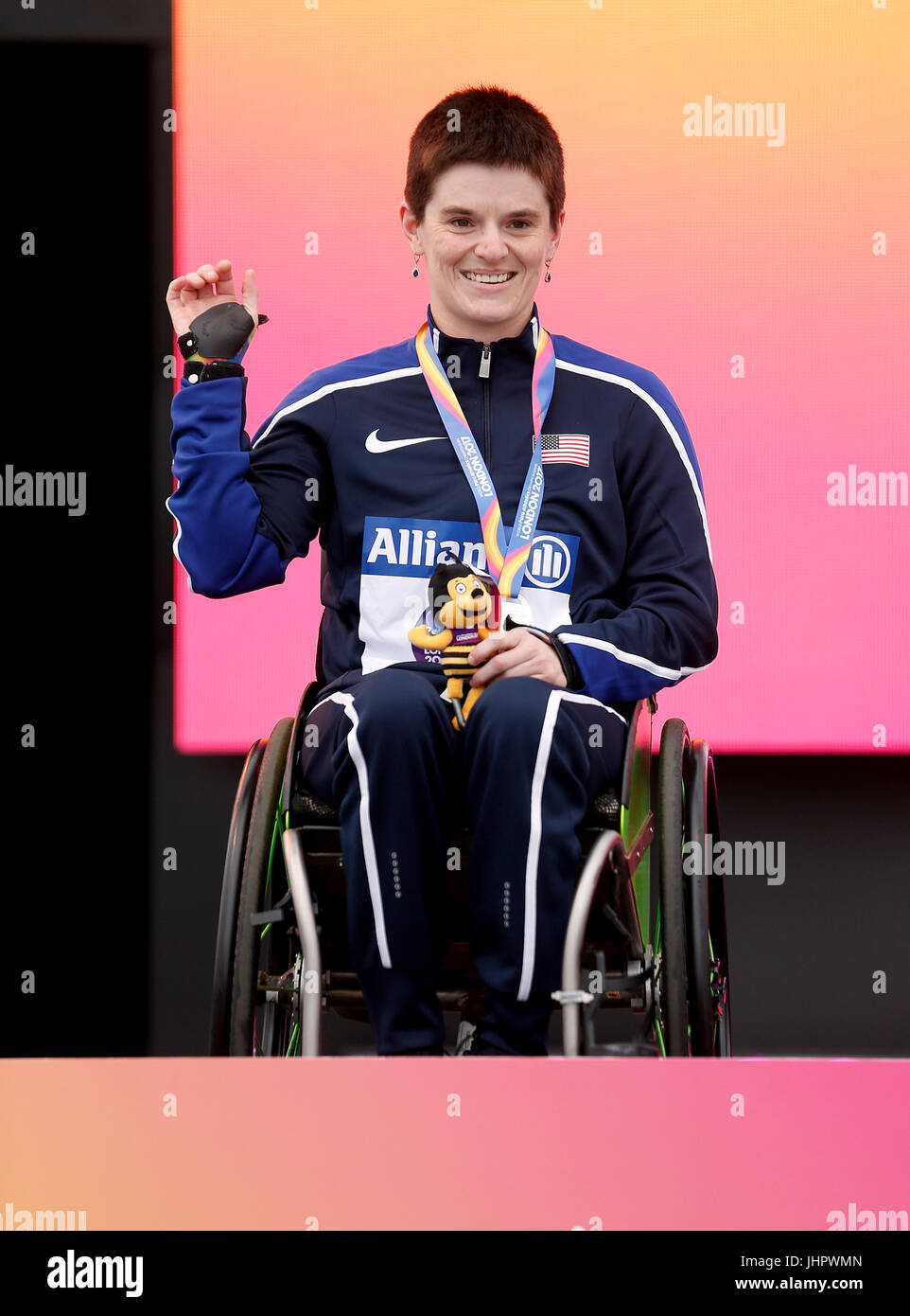USA's Cassie Mitchell with her silver medal on the podium after the ...
