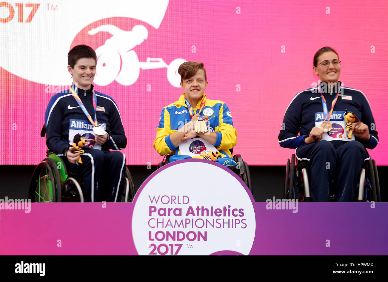 Ukraine's Zoia Ovsii (centre) with her gold medal, USA's Cassie ...
