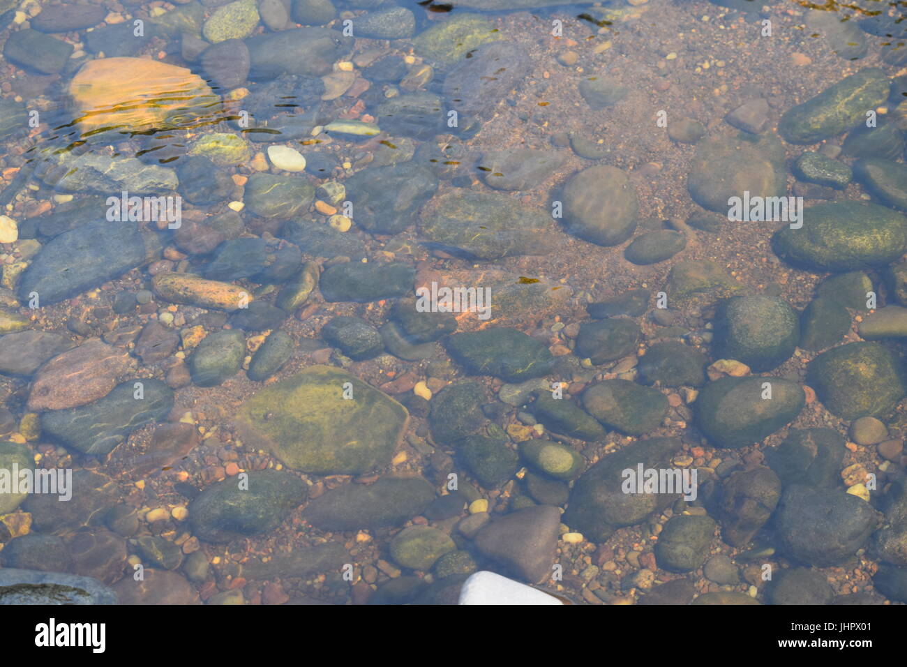 Rocks in water Stock Photo - Alamy