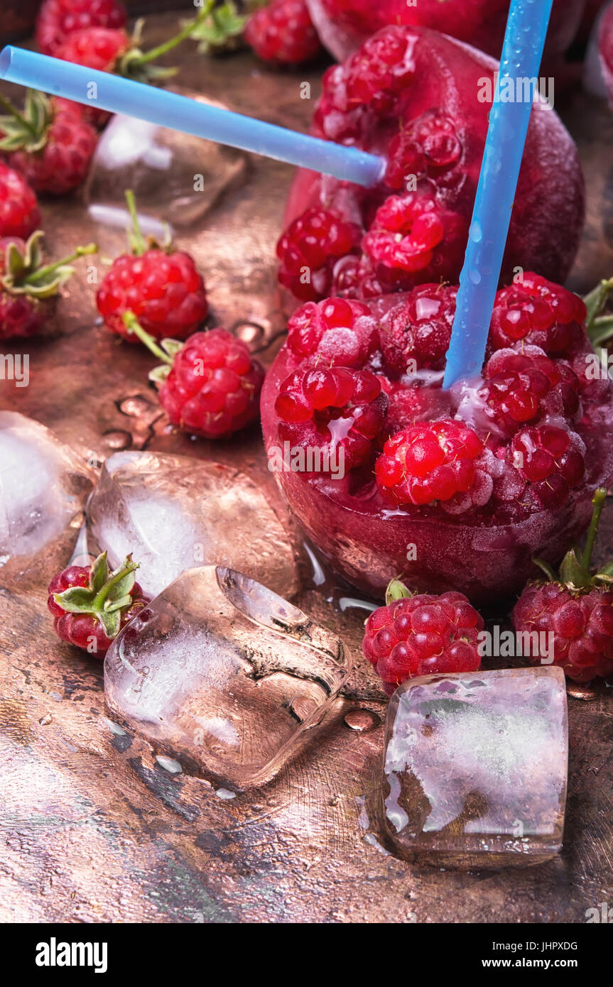 Close up of frozen raspberry juice with ice Stock Photo - Alamy