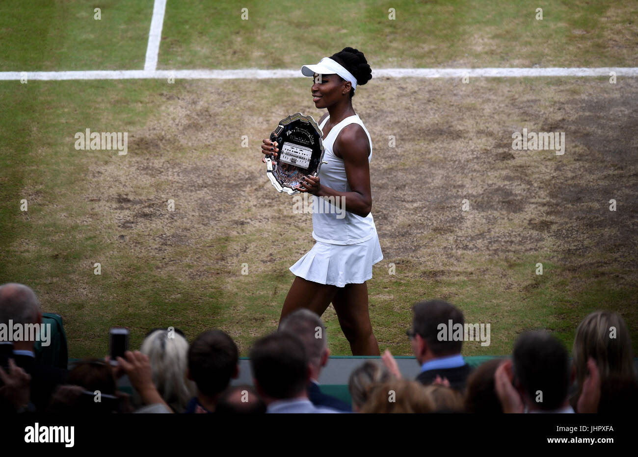 Venus Williams with the runners-up trophy following defeat in the ...