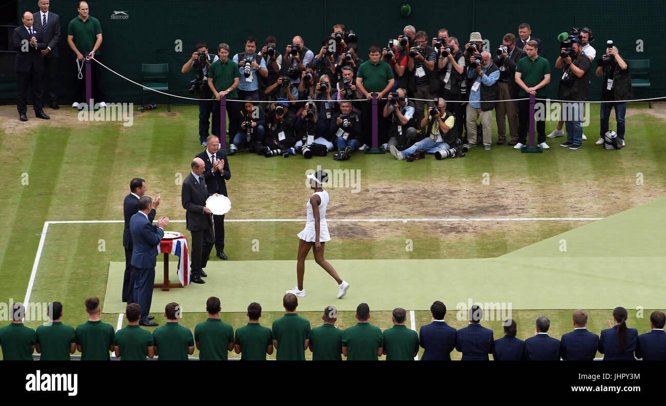 Venus Williams with the runners-up trophy following defeat in the ...
