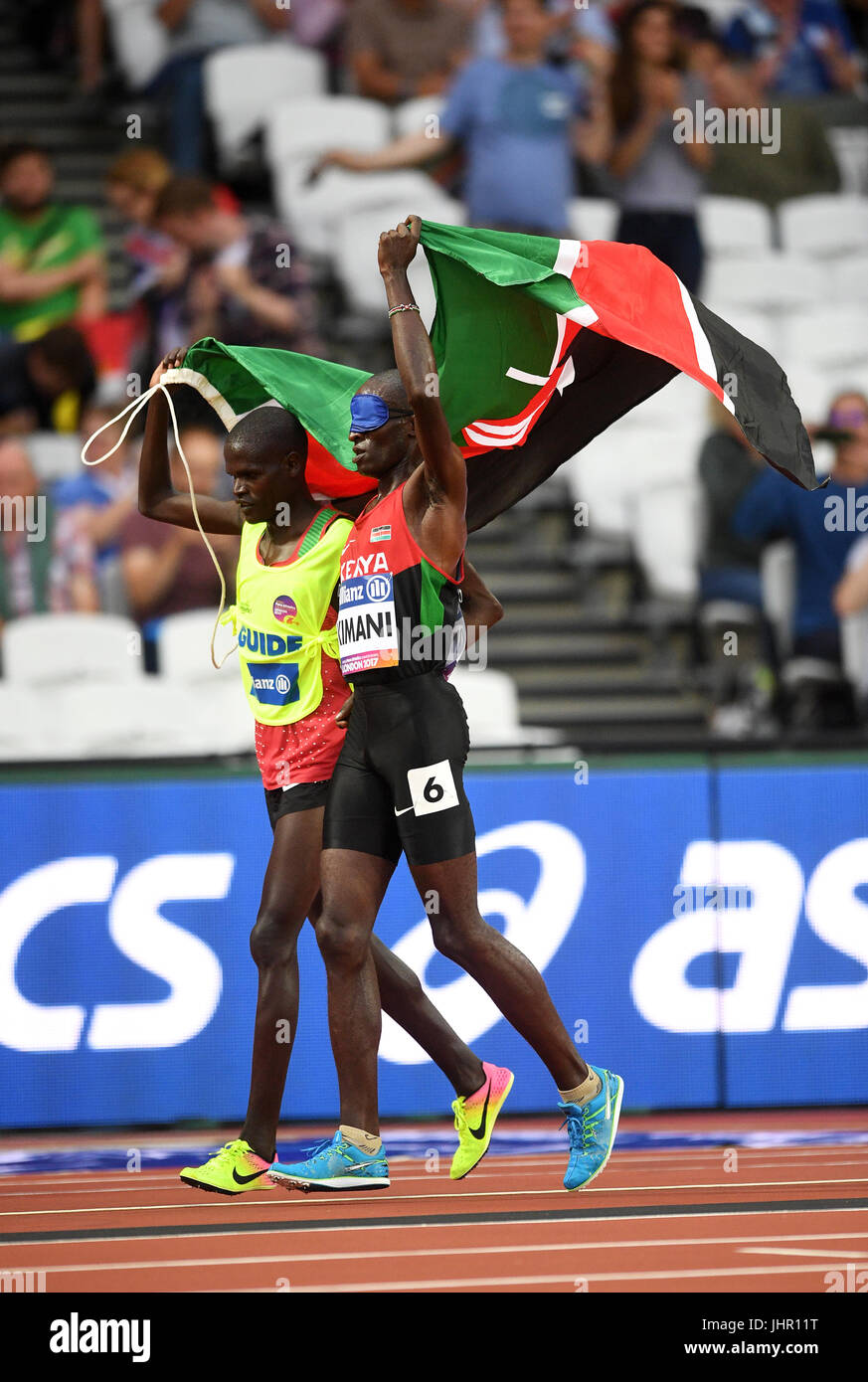 Kenya's Samwel Mushai Kimani and guide James Boit celebrate winning the ...